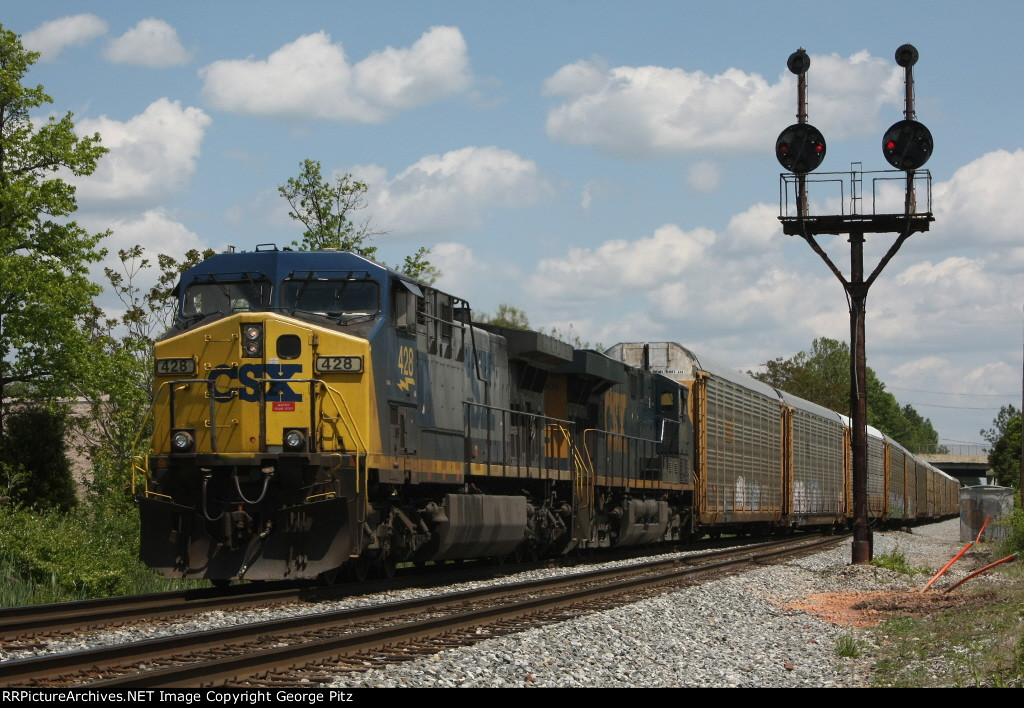 CSX 428 and train Q217